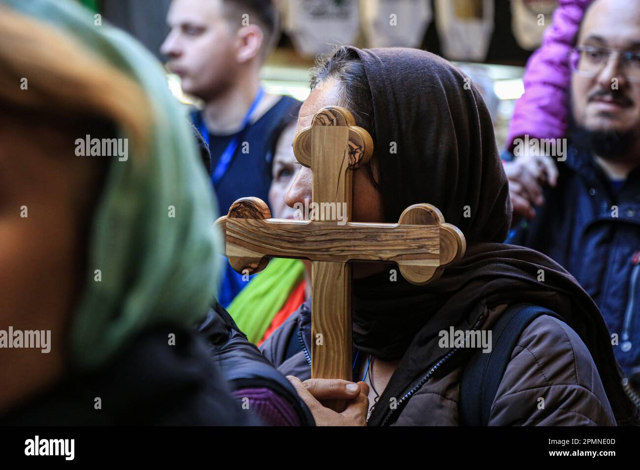East Jerusalem, Israel. 14th Apr, 2023. An Orthodox Christian carries a ...