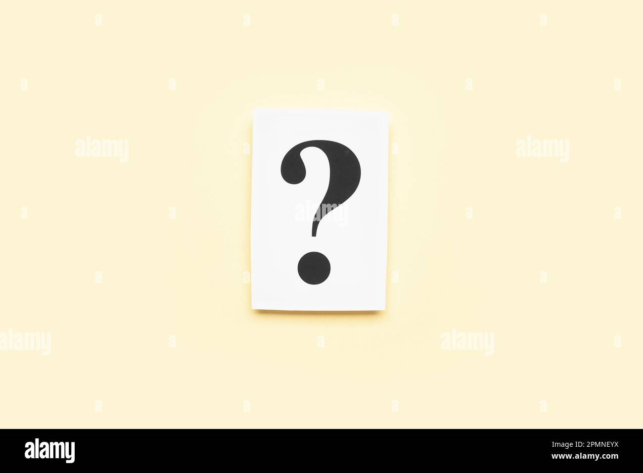 Paper with question mark on yellow background Stock Photo - Alamy