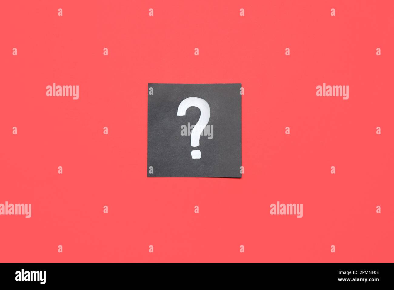 Paper with question mark on red background Stock Photo - Alamy