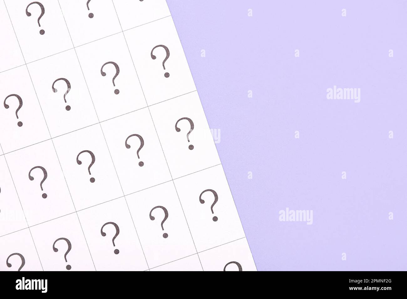 Paper with question marks on lilac background, closeup Stock Photo - Alamy