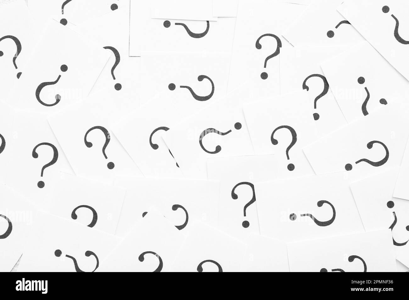 White papers with question marks as background Stock Photo - Alamy