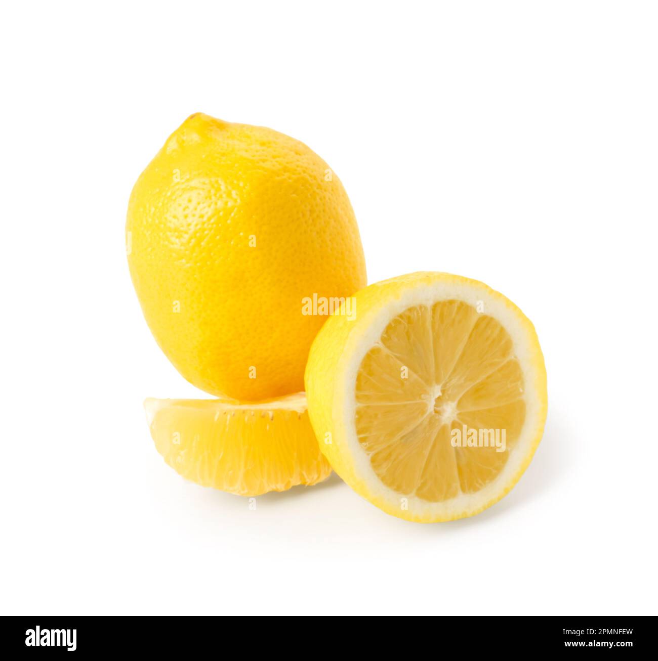 Whole and cut fresh lemons on white background Stock Photo - Alamy