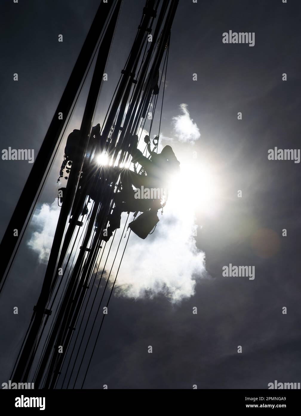 ROTTERDAM - 14/04/2023, Abseilers hang on the 57th floor of the ...
