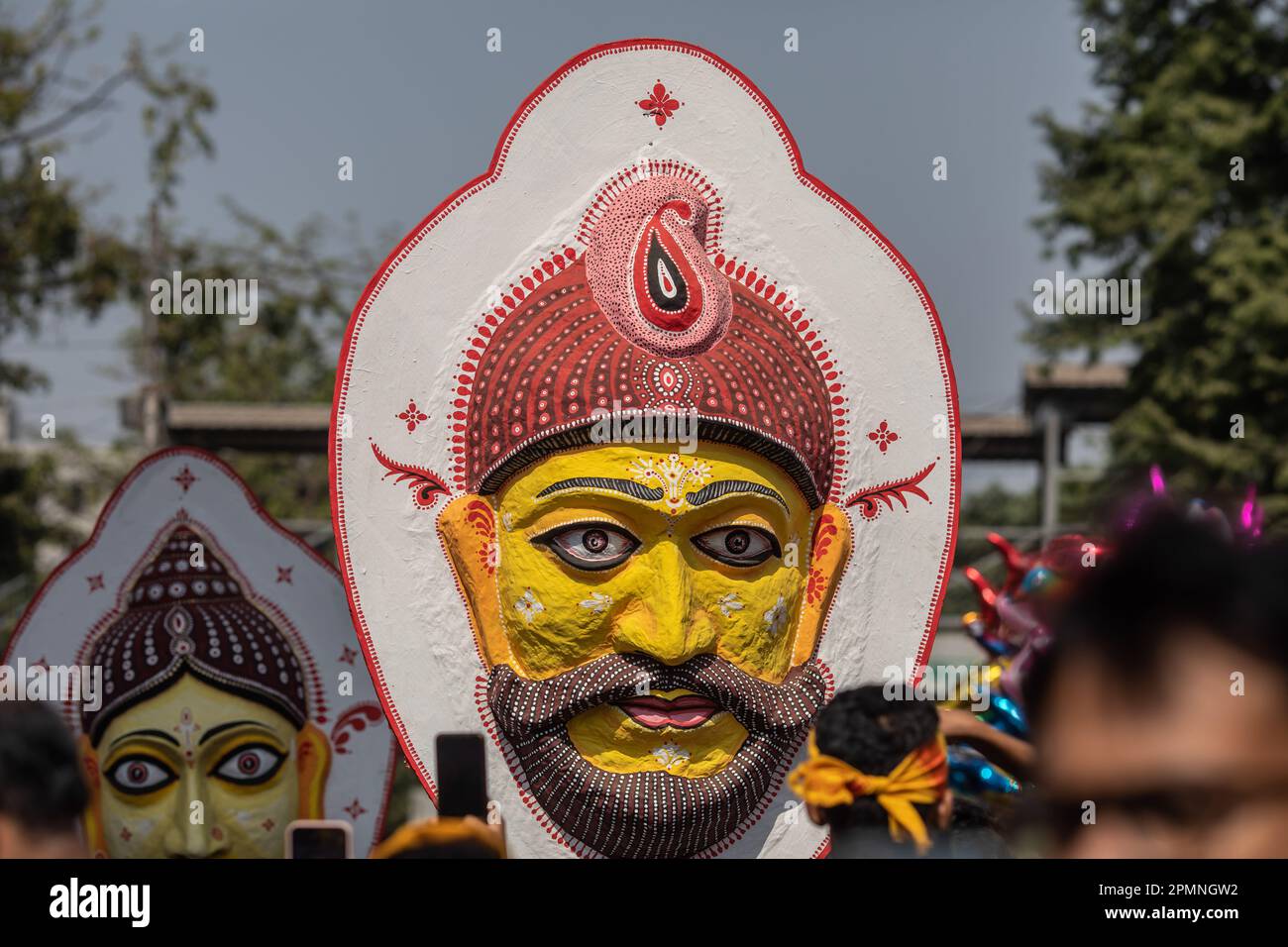 Dhaka, Bangladesh. 14th Apr, 2023. People carry masks during a rally to ...