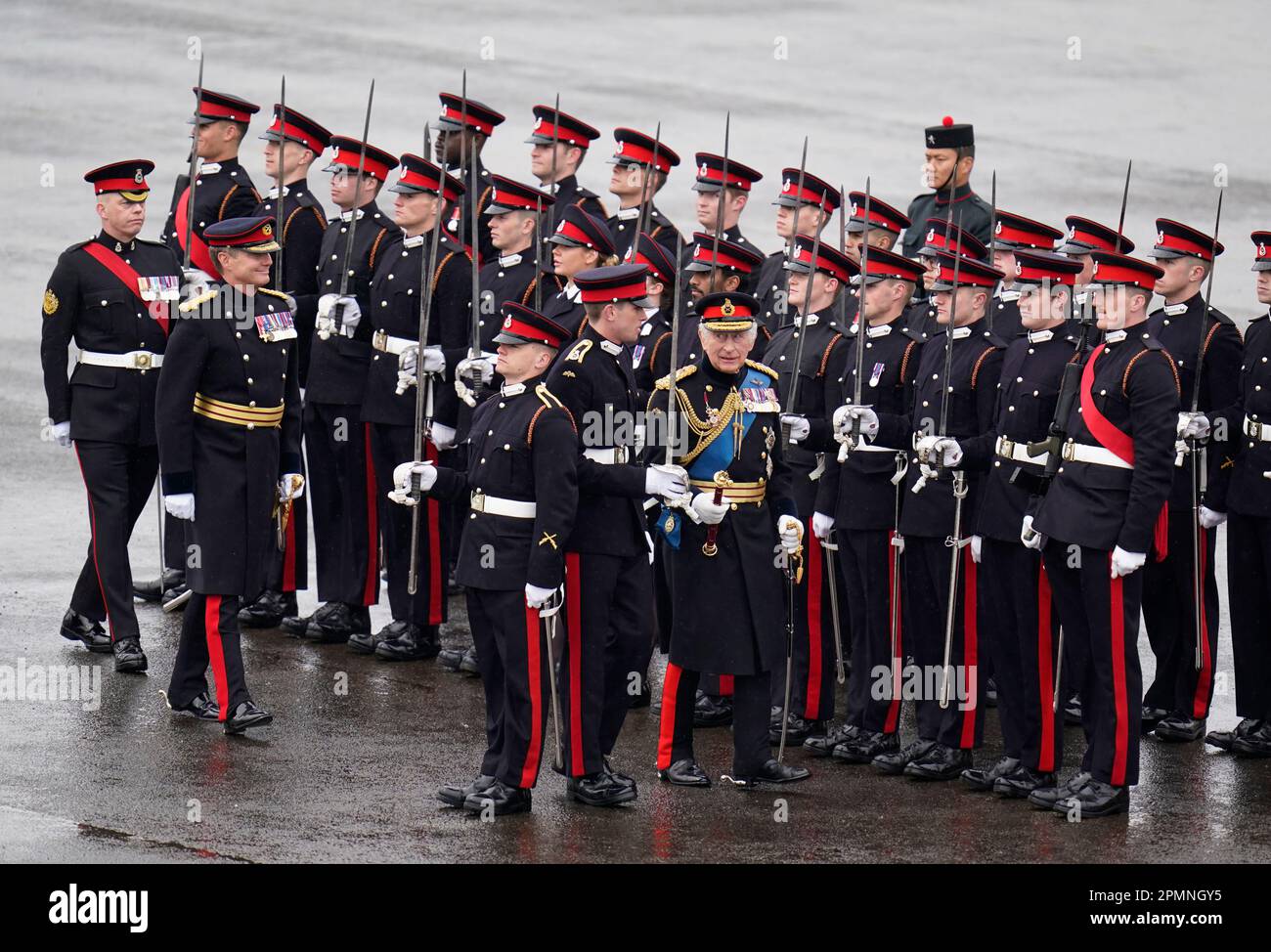 King Charles III inspects Officer Cadets on parade during the 200th ...