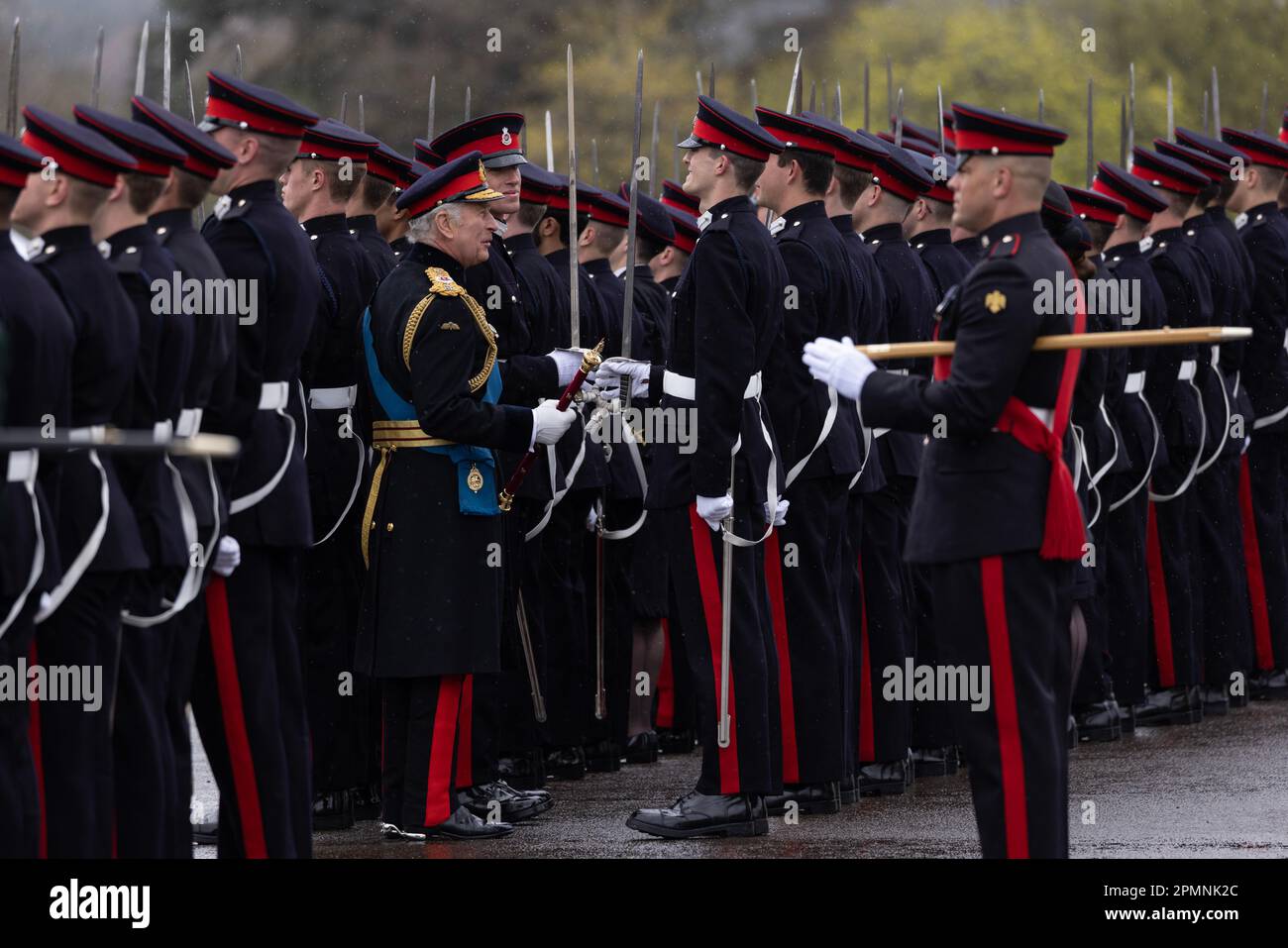 King Charles III inspects Officer Cadets on parade during the 200th ...