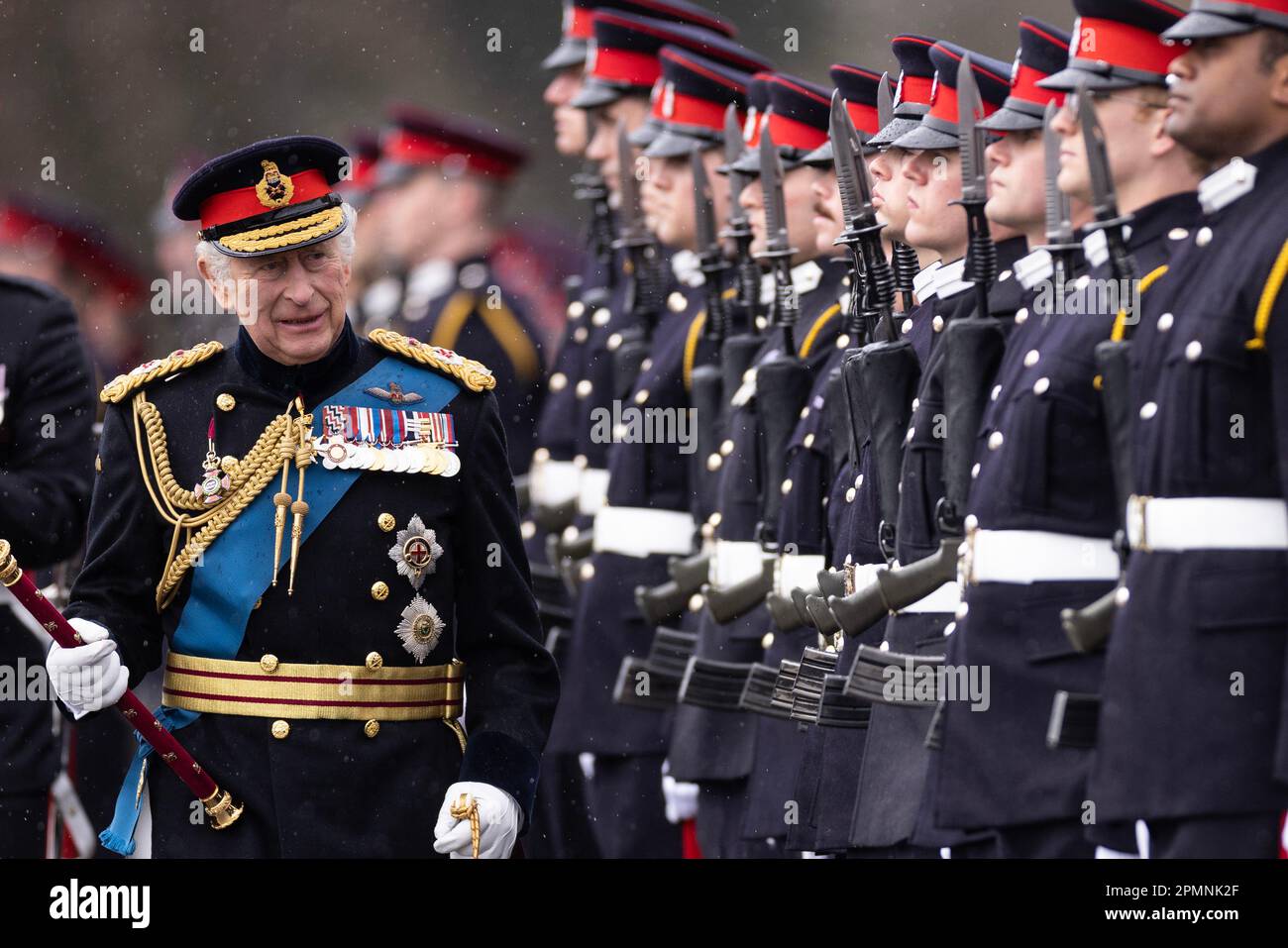 King Charles III inspects Officer Cadets on parade during the 200th ...
