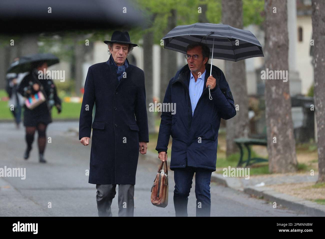 Paris, France. 14th Apr, 2023. Guest arriving at the funeral ceremony ...