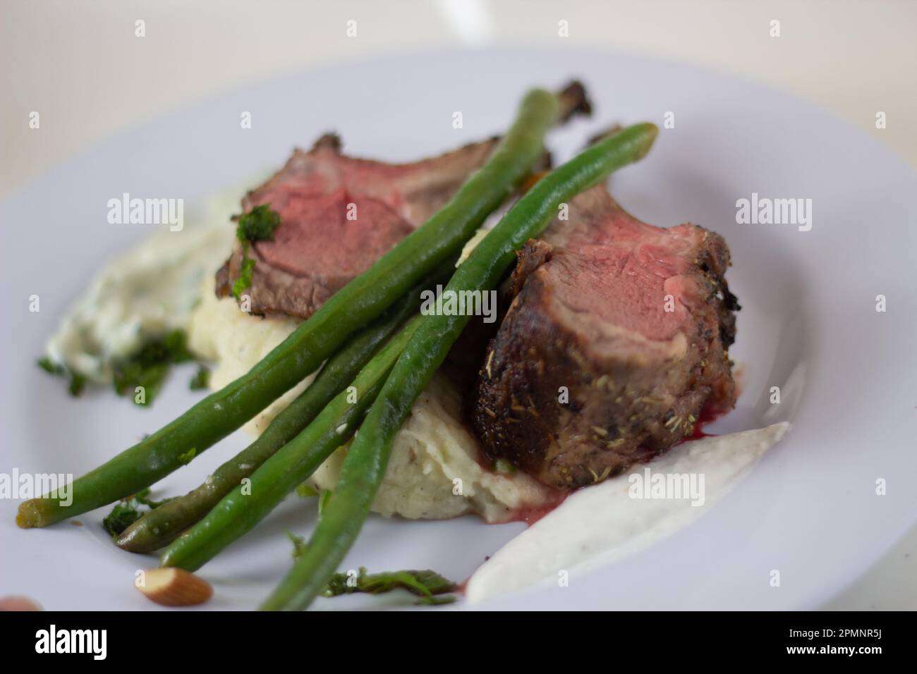 Portion rack lamb sauce hi-res stock photography and images - Alamy
