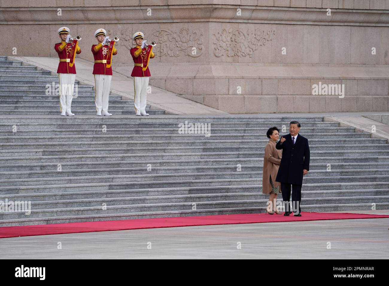 CORRECTS DATE Chinese President Xi Jinping and his wife, Peng Liyuan ...