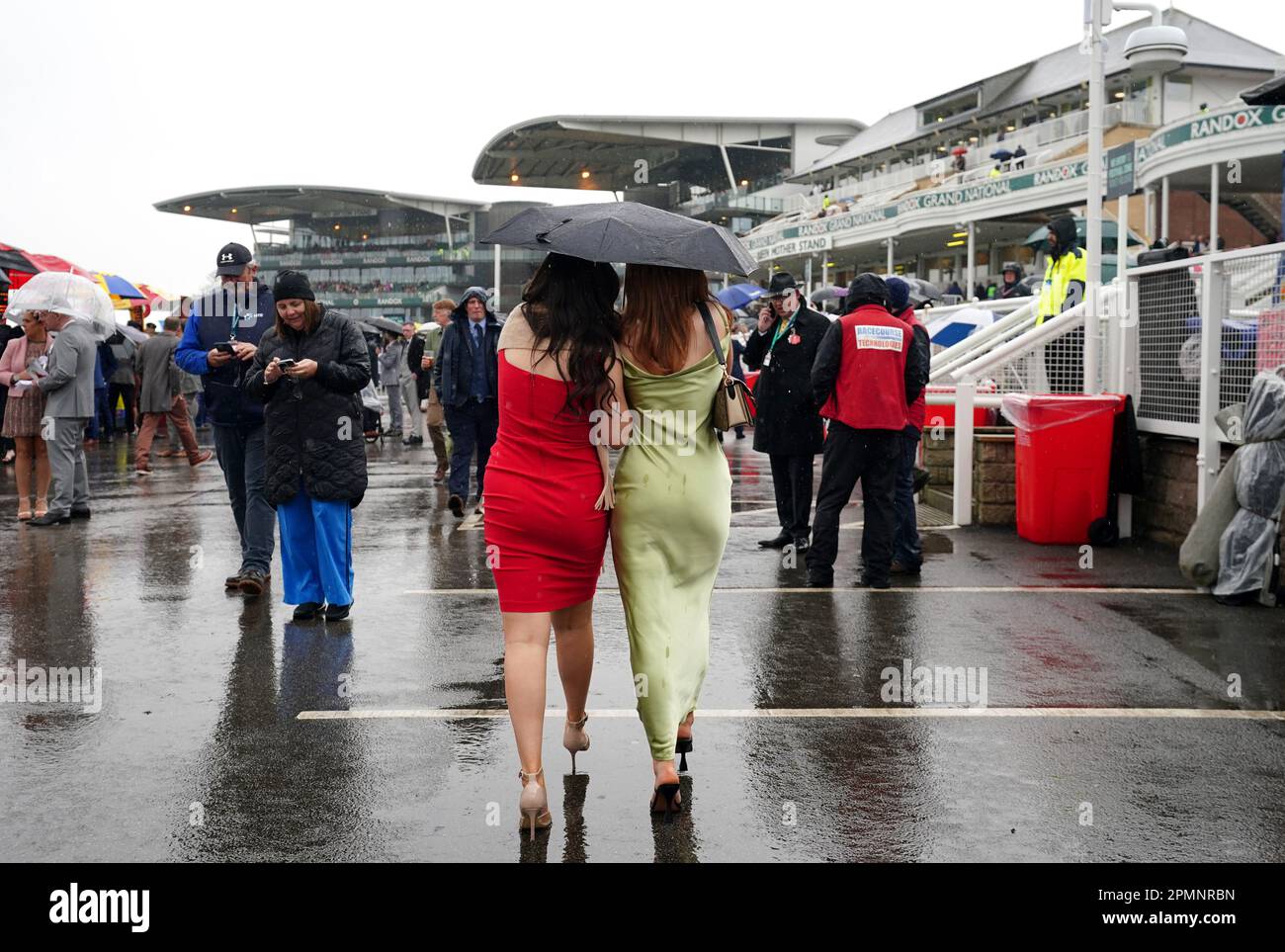 Race goers brave the weather during day two of the Randox Grand ...