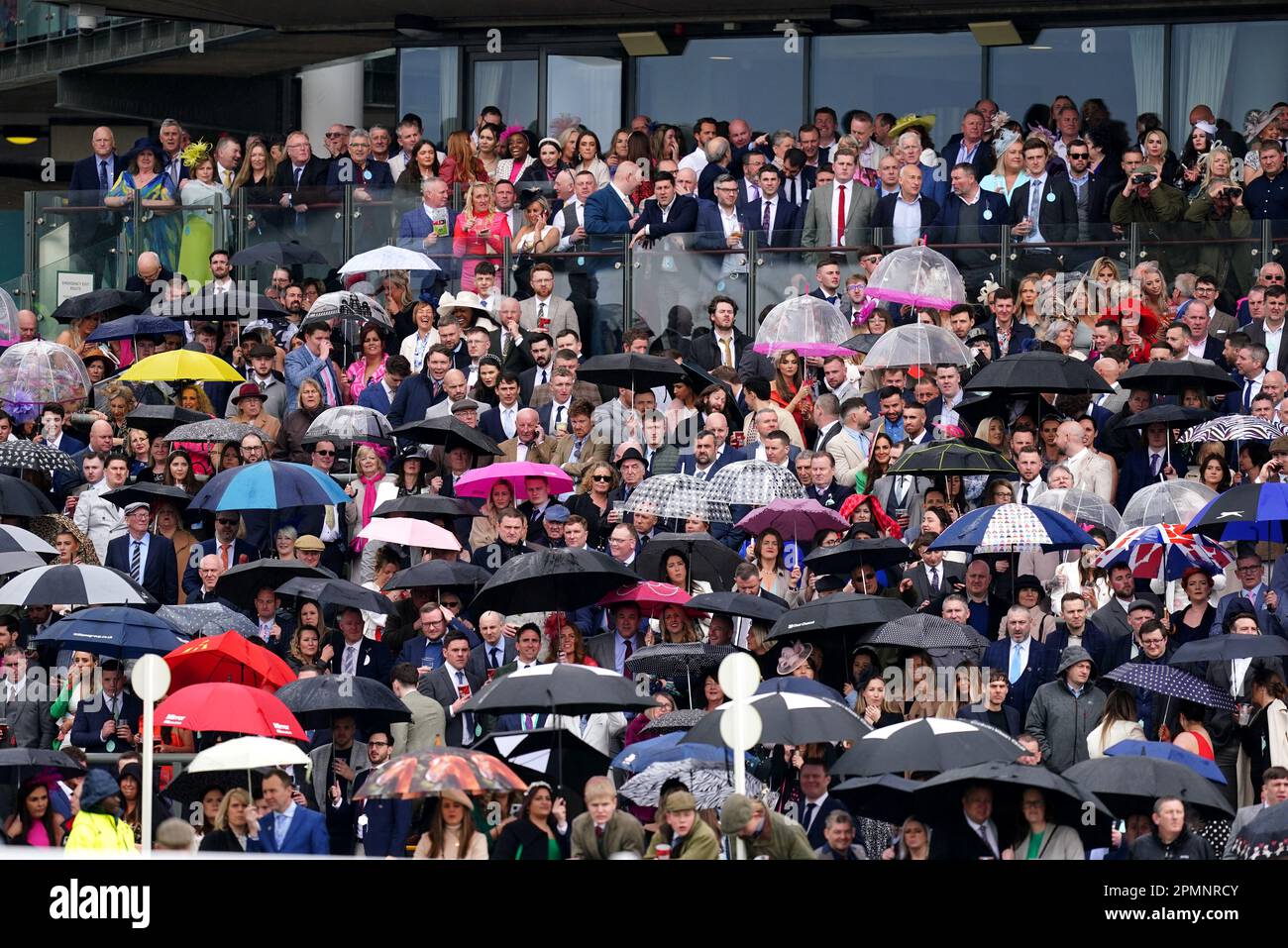 Race goers brave the weather during day two of the Randox Grand ...