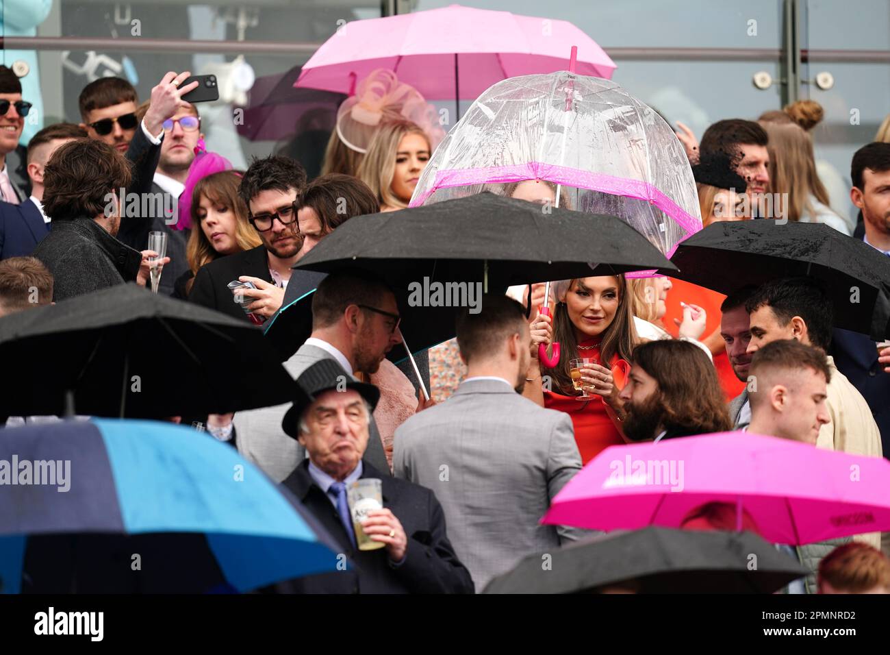 Race goers brave the weather during day two of the Randox Grand ...
