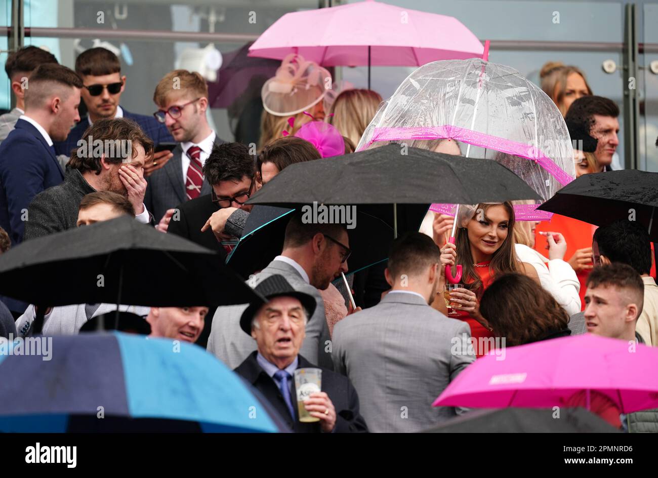 Race goers brave the weather during day two of the Randox Grand ...