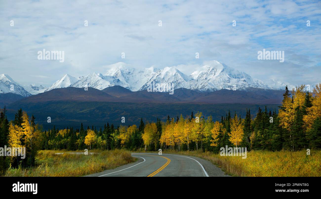 A twisting highway reveals a stunning autumn view of the Rainbow Ridge ...