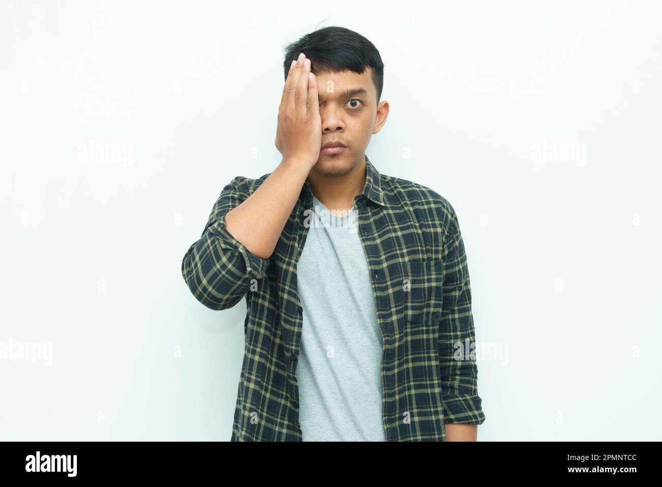 Asian man hand eye hi-res stock photography and images - Alamy
