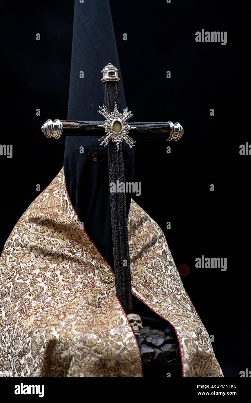 Penitents wearing black pointed hoods process from St. Mary Major ...