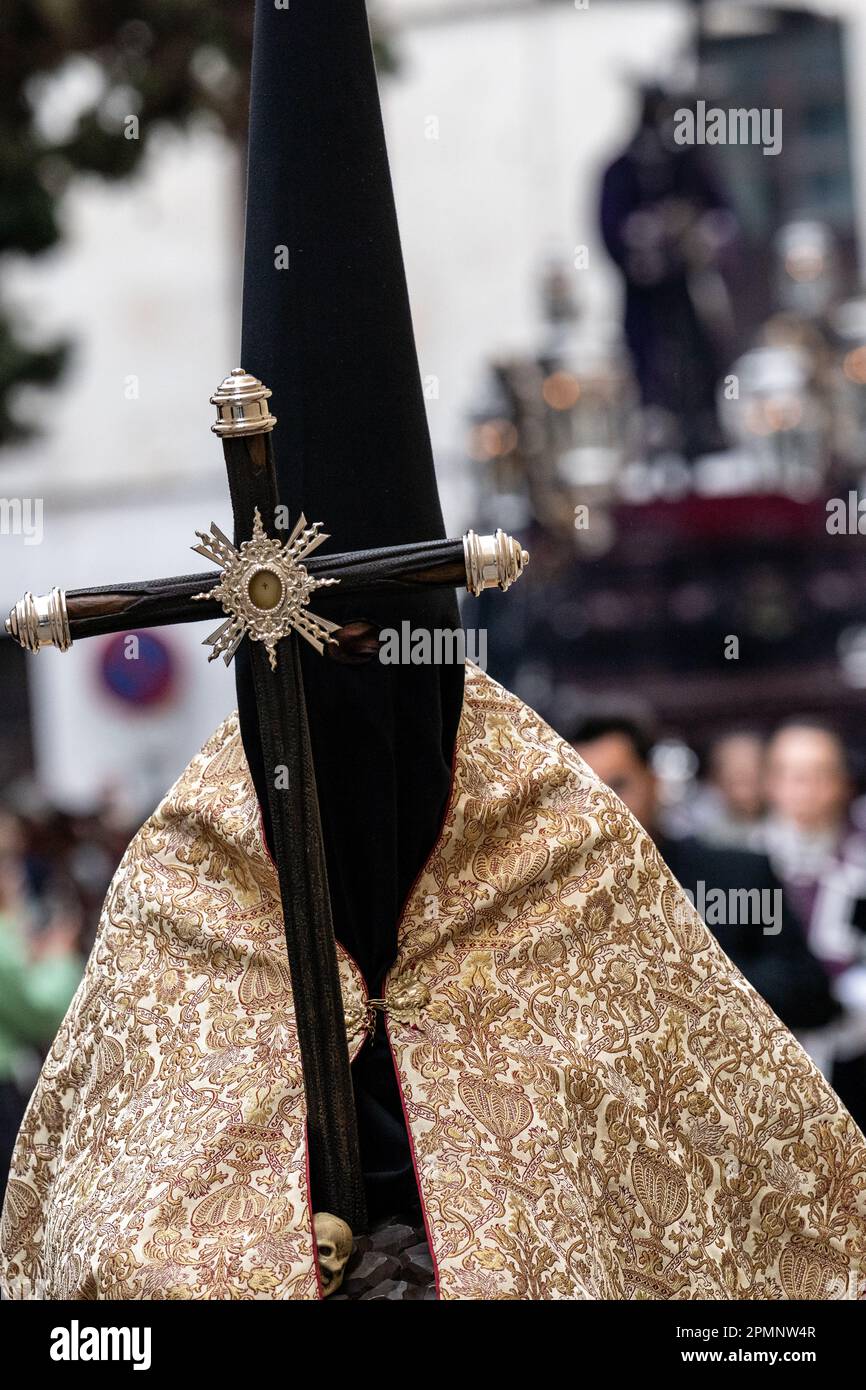 Penitents wearing black pointed hoods process from St. Mary Major ...