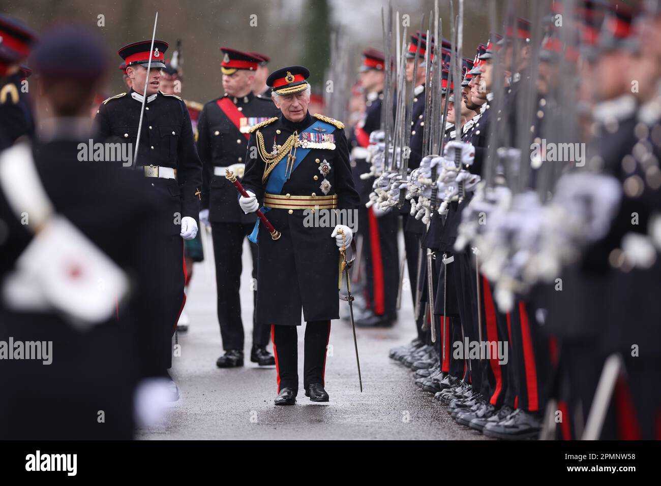 King Charles III inspects Officer Cadets on parade during the 200th ...