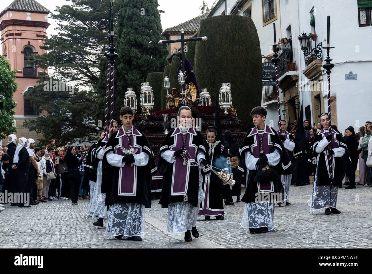 Altar children lead a process of Jesus of the Column during Holy Week ...