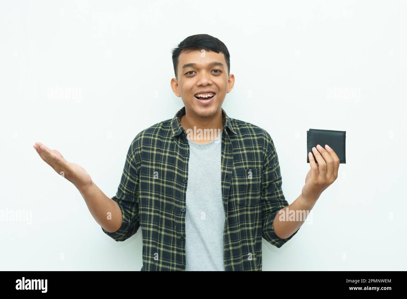 Portrait happy man holding wallet hi-res stock photography and images ...