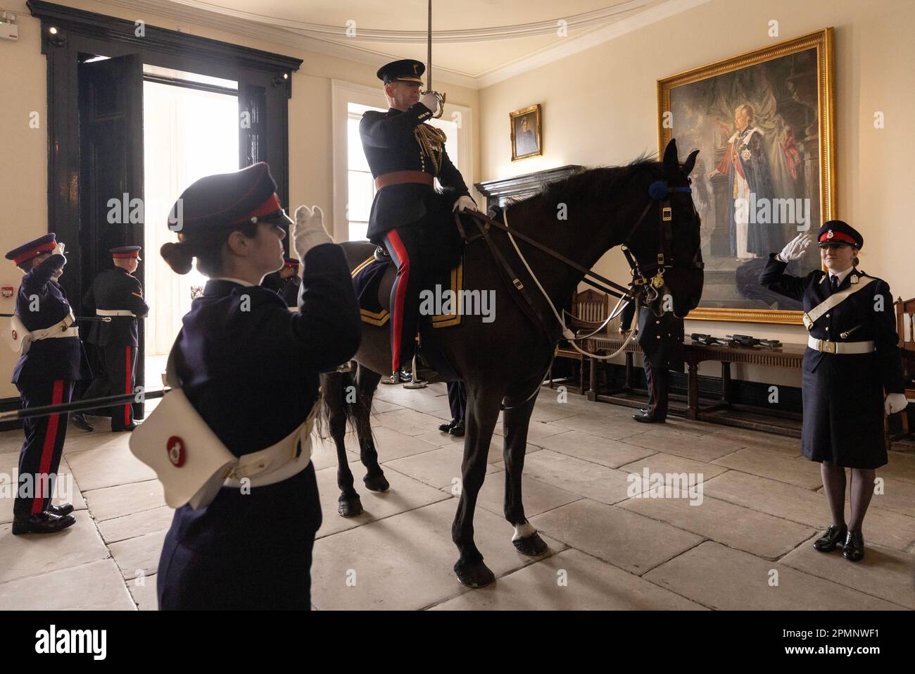 Major C Davies rides Faulkner through the main doors of the academy for ...