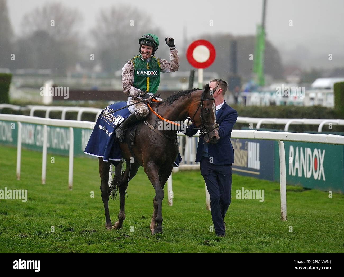 Ben Harvey celebrates winning thethe William Hill Handicap Hurdle on ...