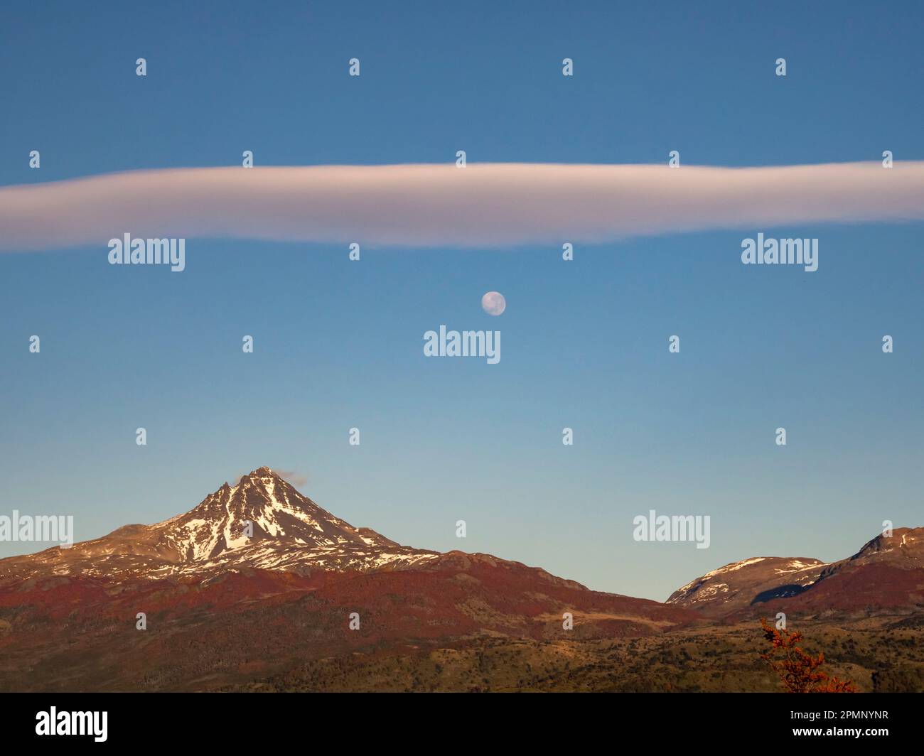 Full moon setting over Mount Donoso in Torres del Paine National Park ...