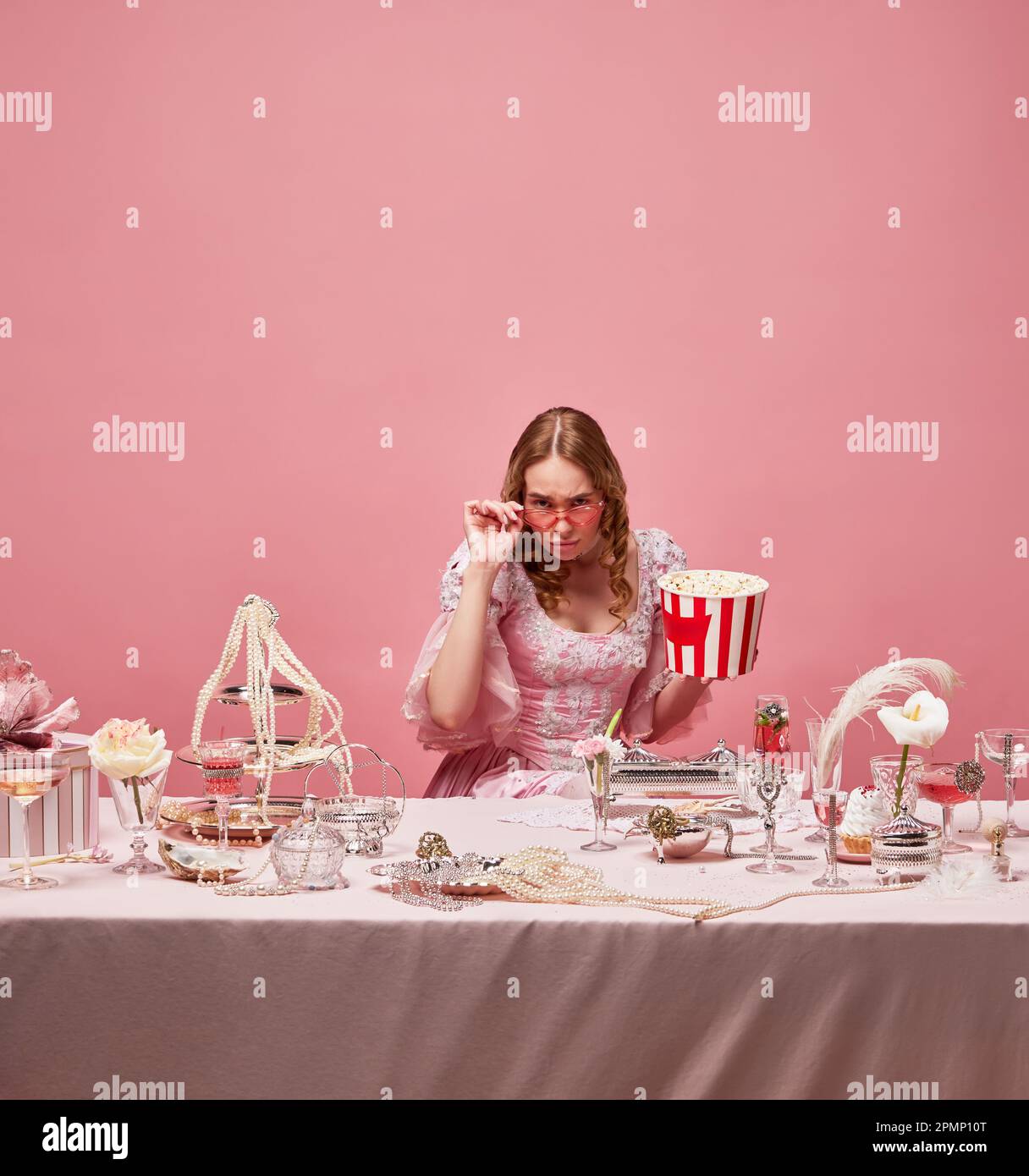 Fairy tale blond princess wearing renaissance dress sitting near the ...