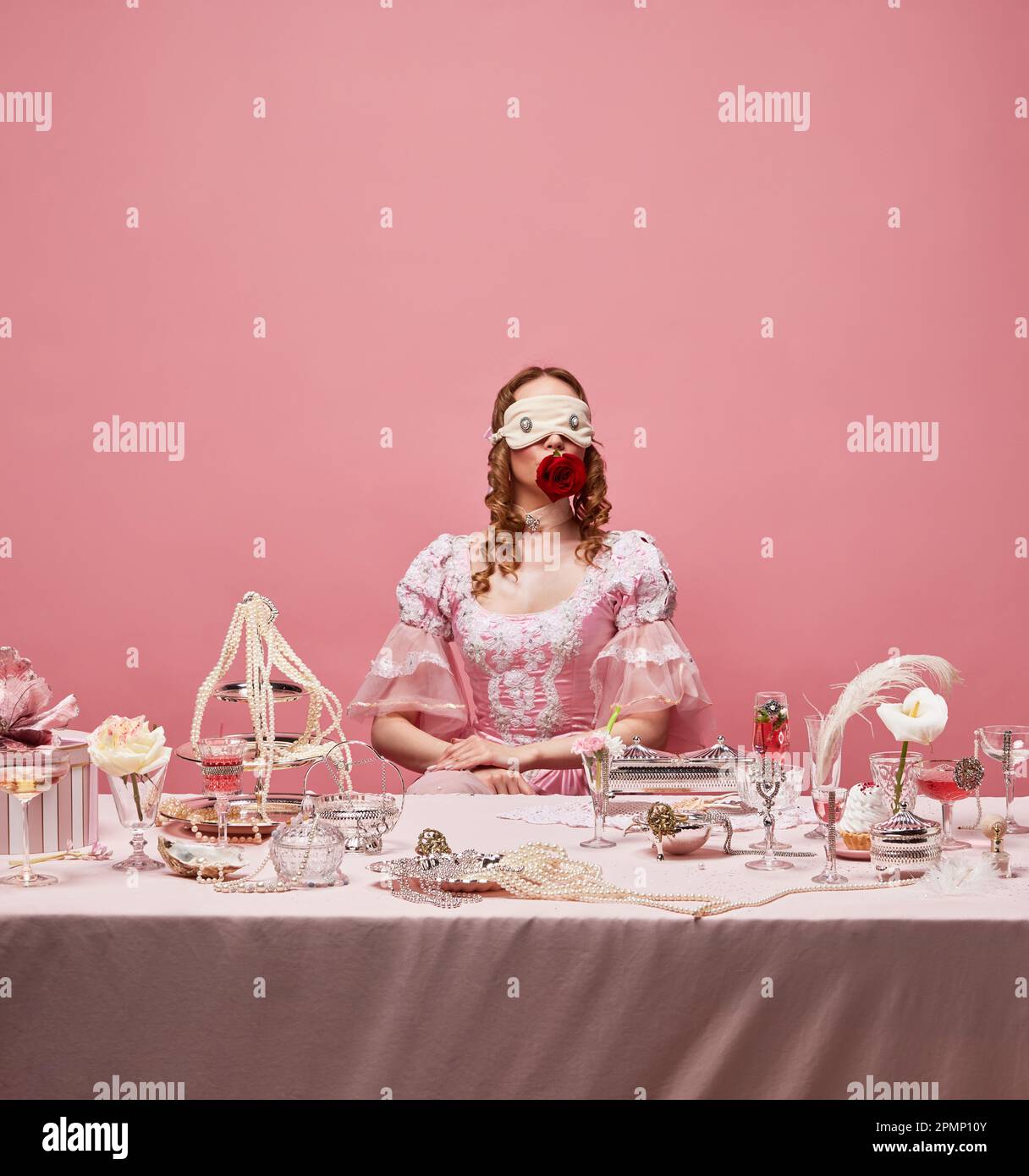 Portrait of charming queen wearing sleep mask and sitting at laying ...