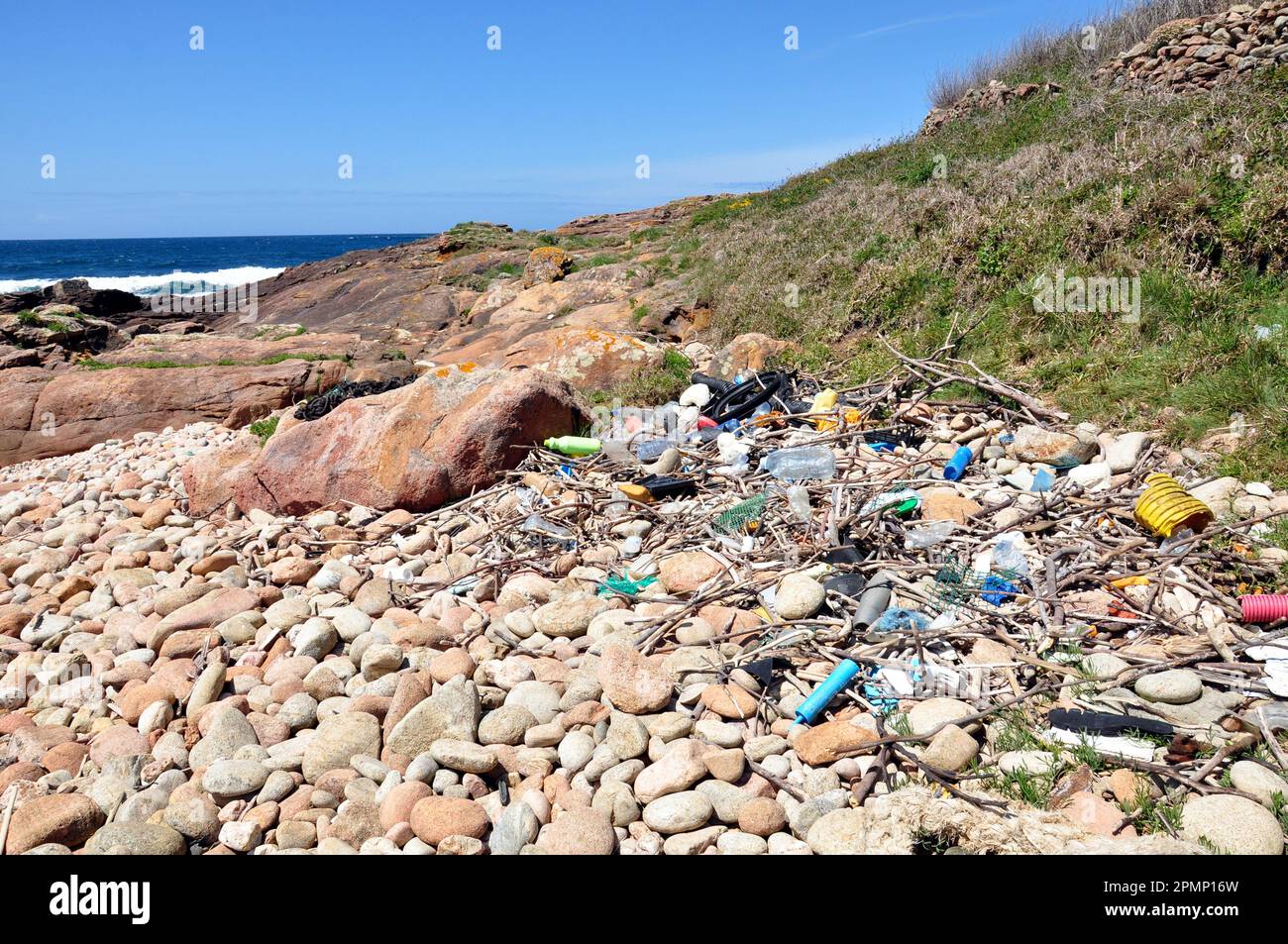 Plastic waste on beach Stock Photo - Alamy