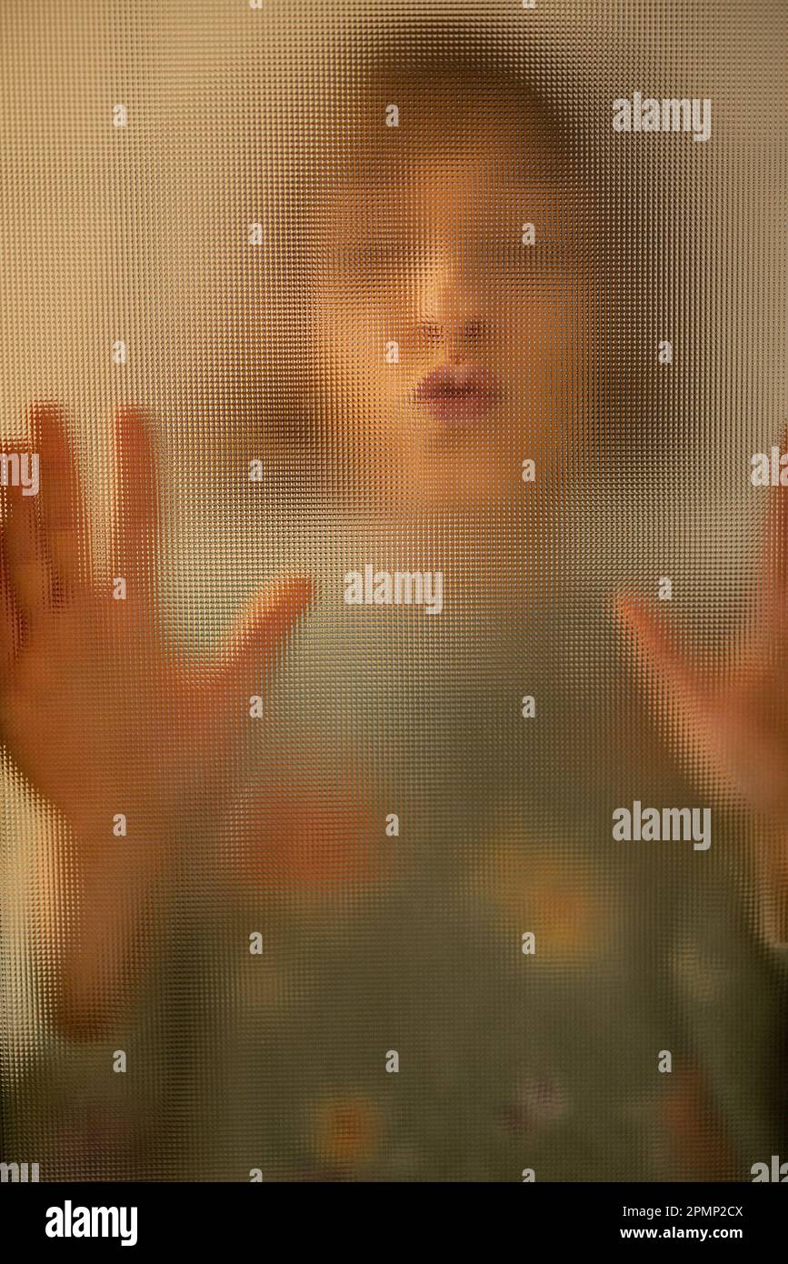 Women's portrait through a matte glass Stock Photo - Alamy