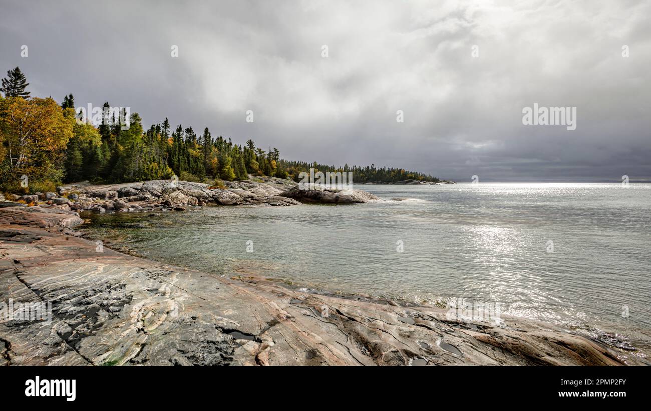 Rocky shoreline of Lake Superior in autumn; Terrace Bay, Ontario ...