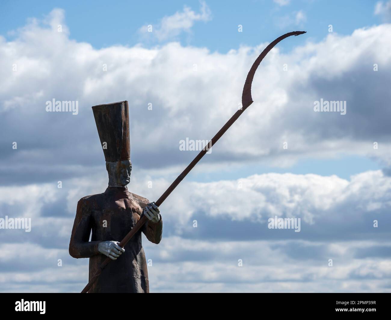 Sculpture on dike at River Elbe, Mödlich, ferryman bringing people to ...