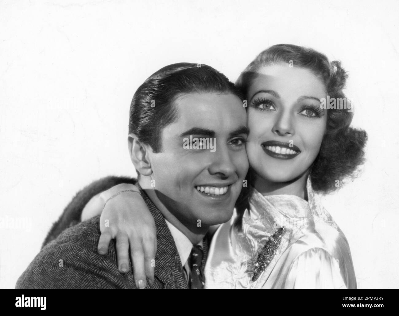 TYRONE POWER and LORETTA YOUNG Portrait in LOVE IS NEWS 1937 director ...
