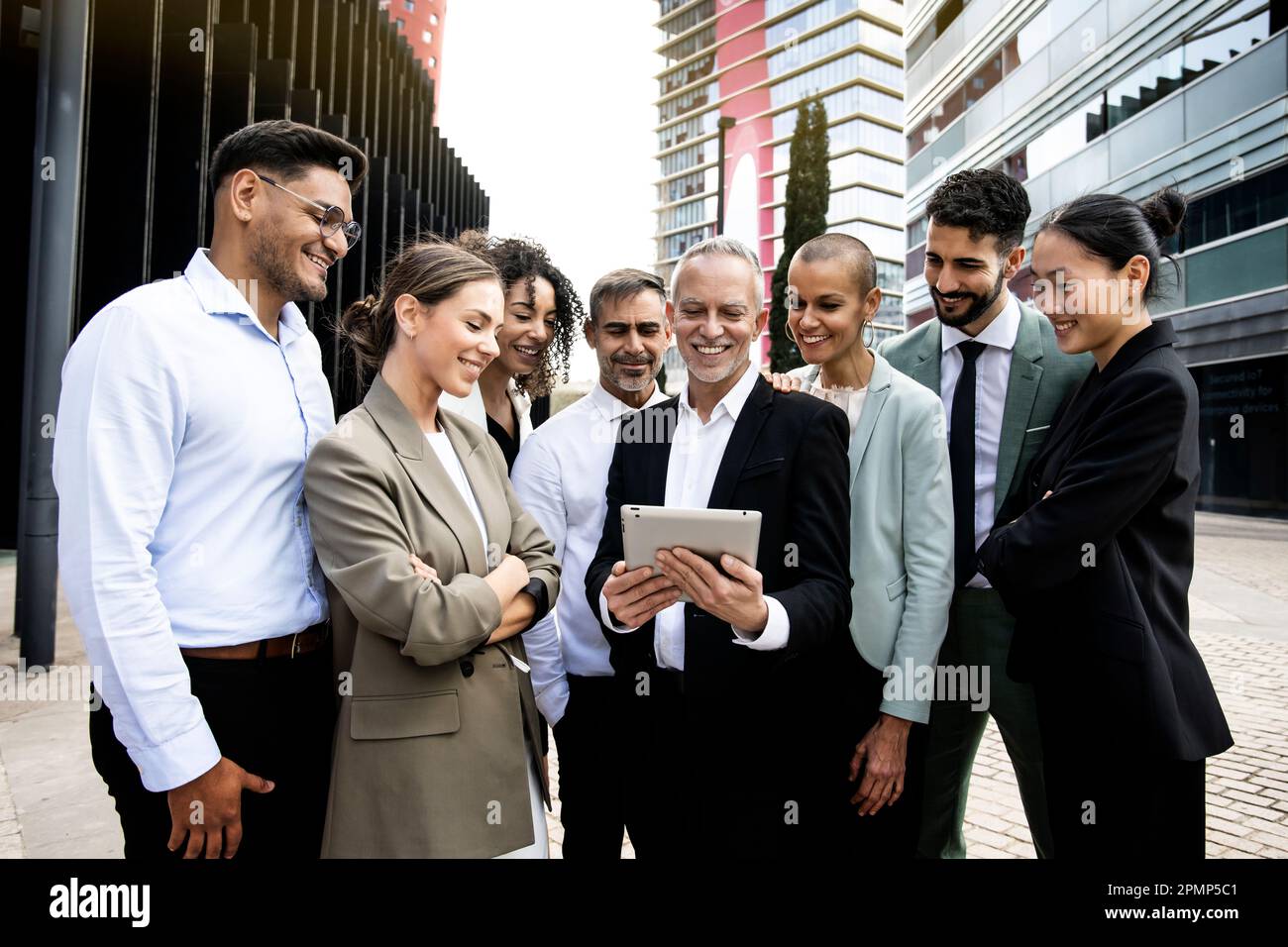 Group of successful multiracial corporate business team looking at ...