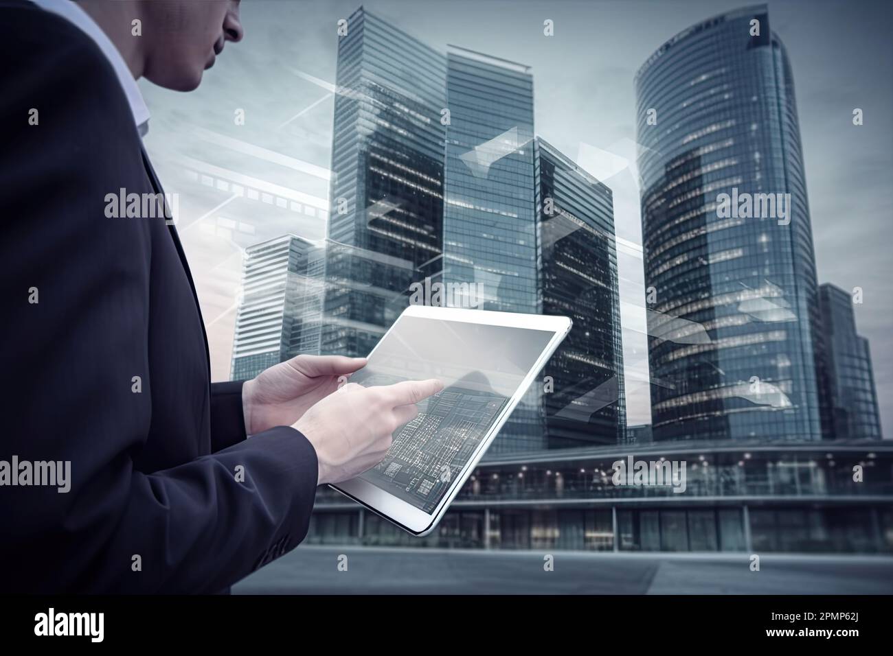 businessman using a tablet with office buildings in the background ...
