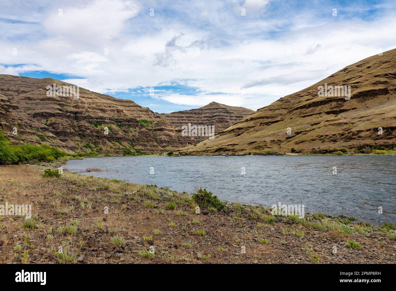 Wild Snake River and the exposed geologic and eroding cliffs as seen ...
