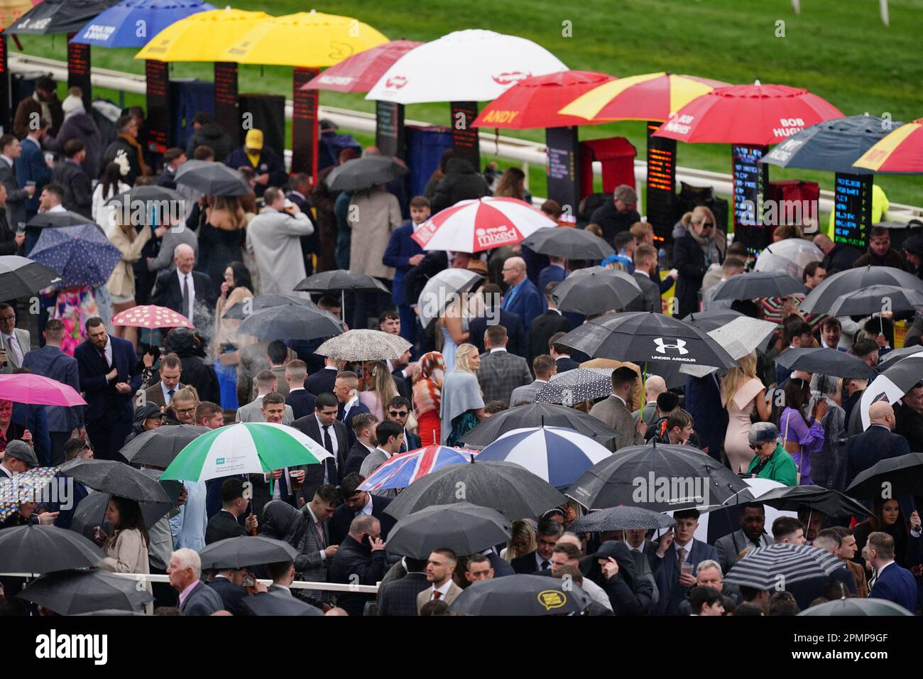 Race goers brave the weather during day two of the Randox Grand ...