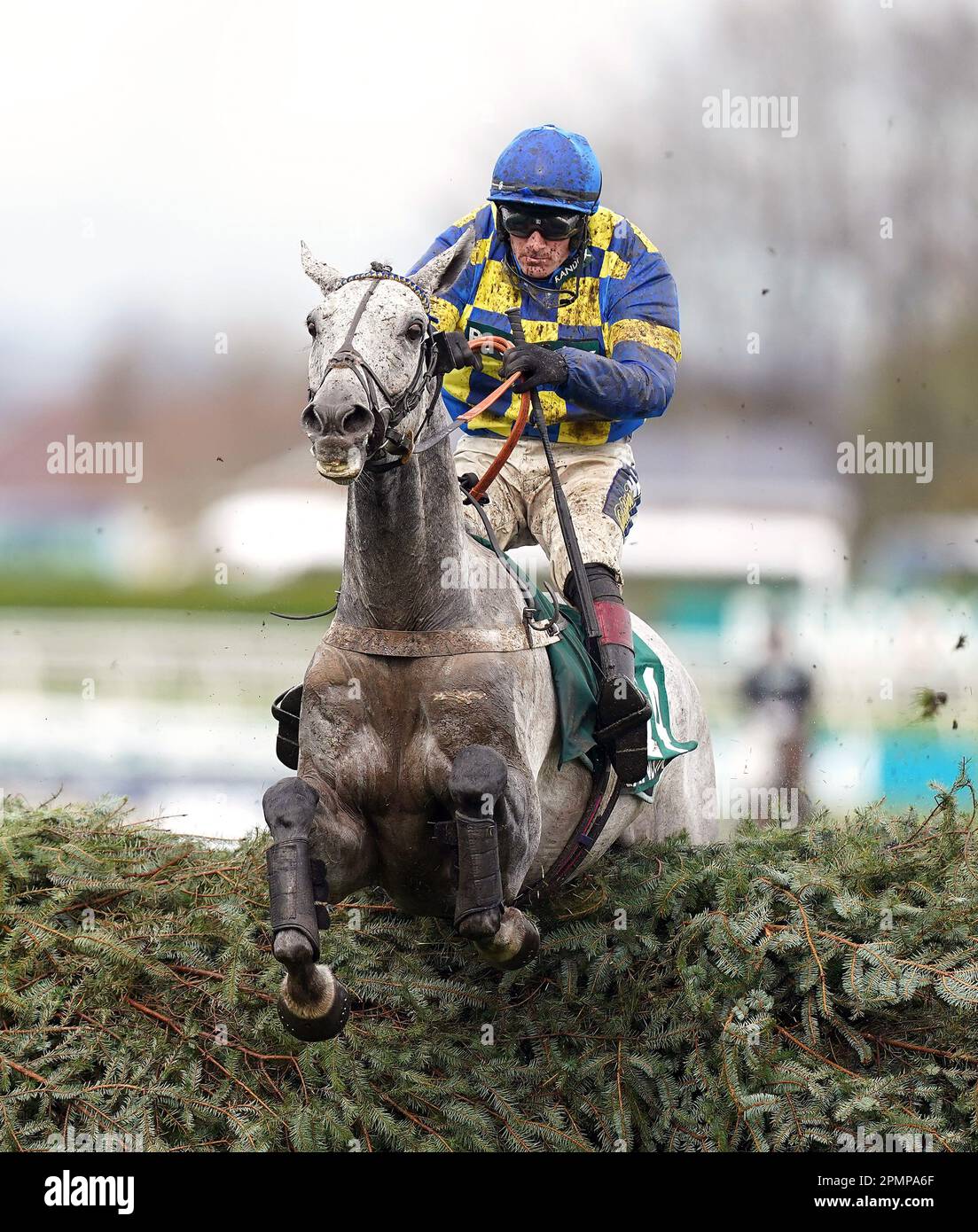 Bill Baxter ridden by jockey Sam Twiston-Davies clear a fence on their ...