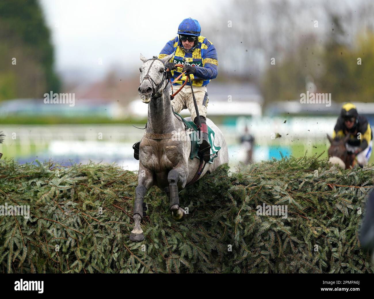 Bill Baxter ridden by jockey Sam Twiston-Davies clear a fence on their ...