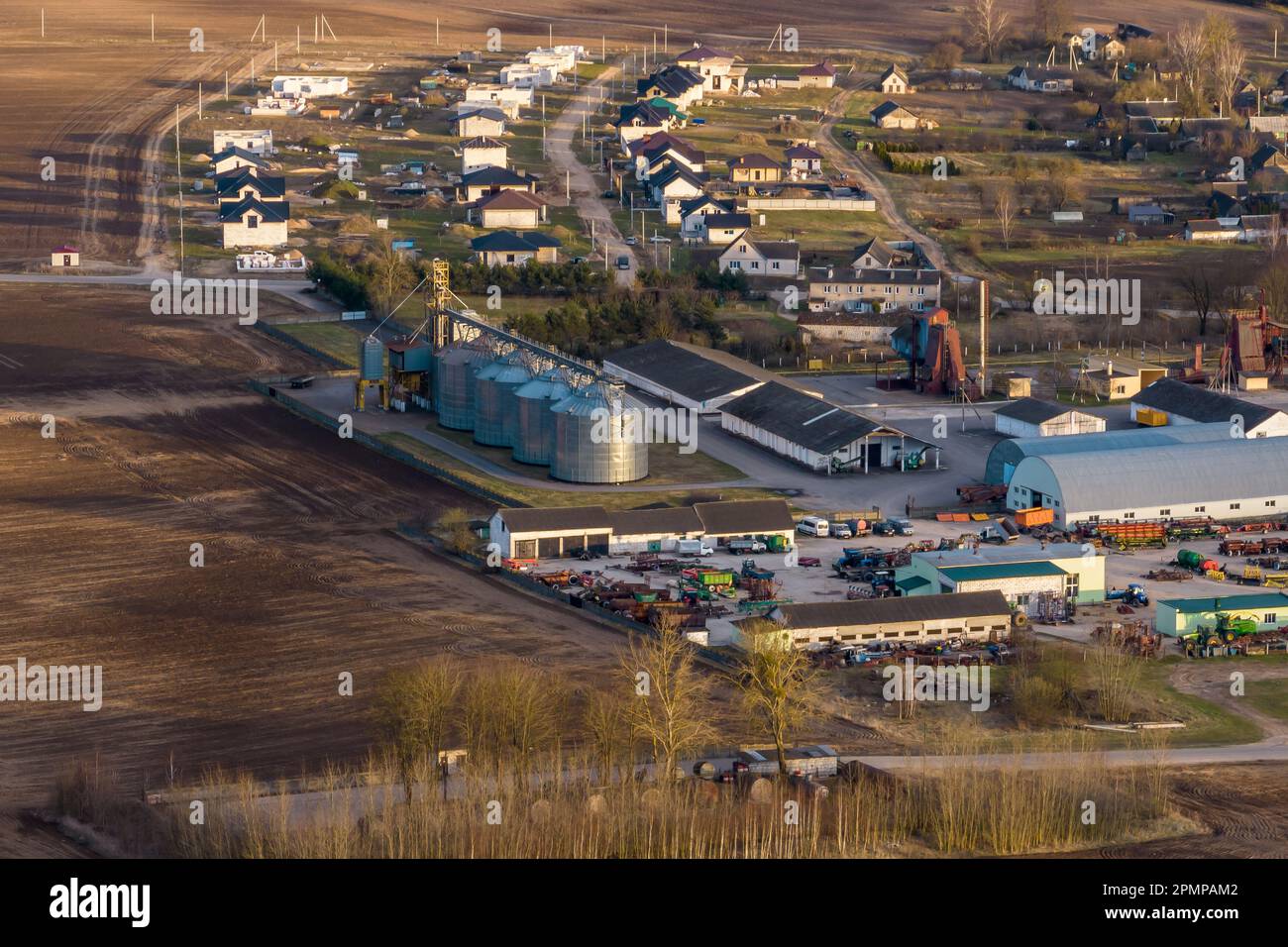 aerial panoramic view on agro-industrial complex with silos and grain ...