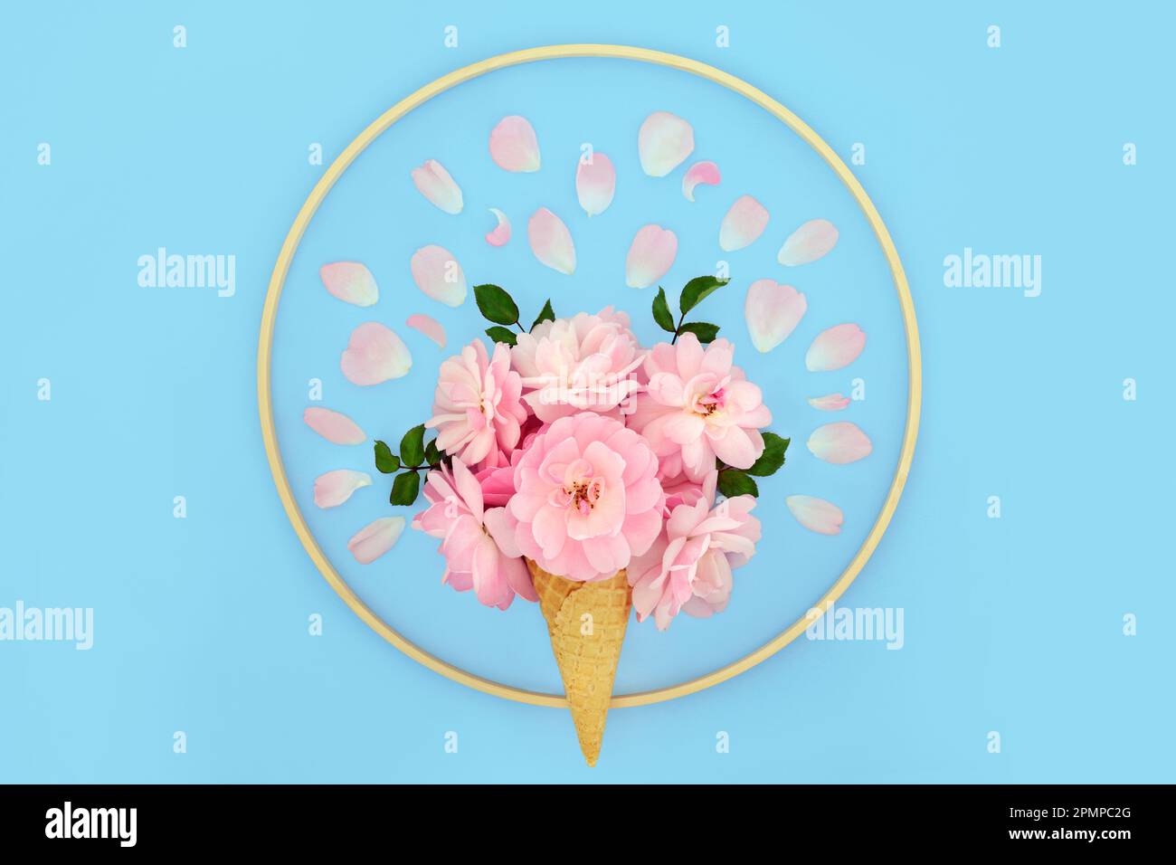Surreal pink rose flower ice cream cone on pastel blue background with ...