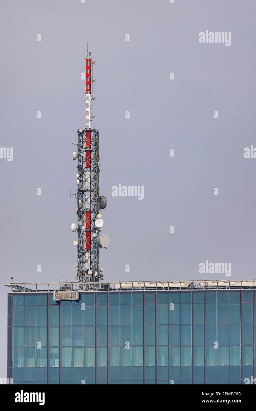 Large Communication Antenna at Top of Modern Glass Skyscraper Tower ...
