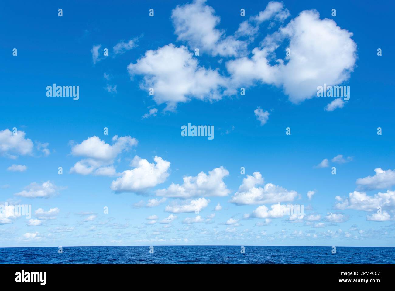 Clouds in a blue sky over the ocean; Florida Keys, Florida, United ...