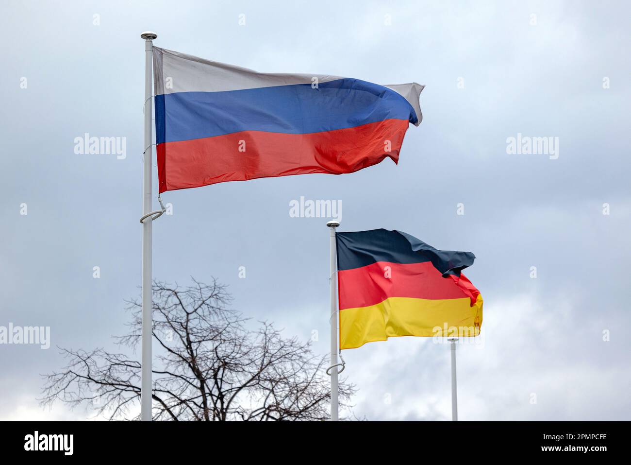 Republic of Germany and Russian Federation Flags Together at Cloudy Sky ...