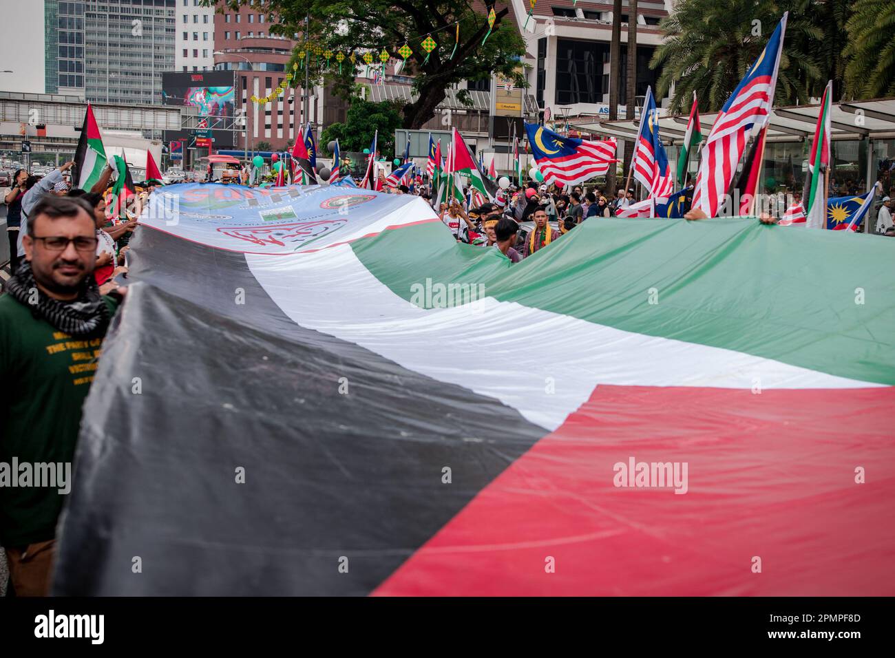 Wilayah Persekutuan, Malaysia. 14th Apr, 2023. Demonstrators hold a ...
