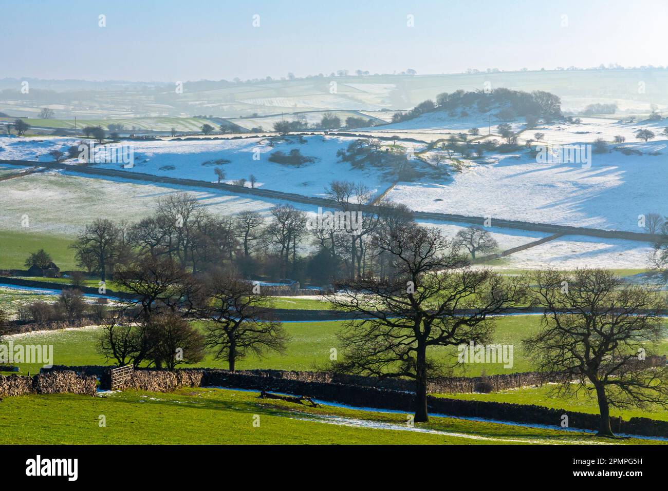 Snow covered landscape with trees on the High Peak Trail near ...