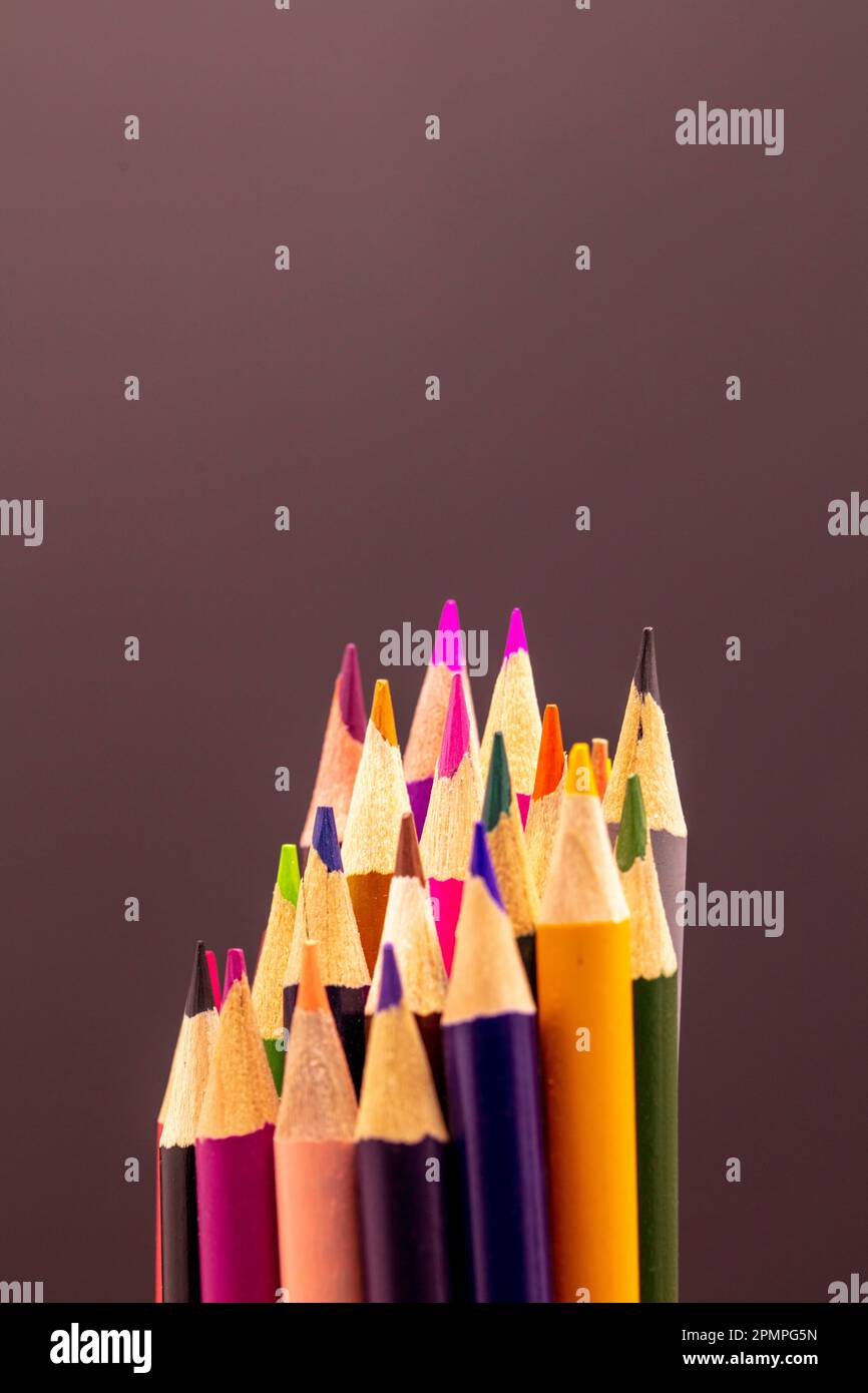 Dynamic close up still life of art coloured pencils grouped together in ...