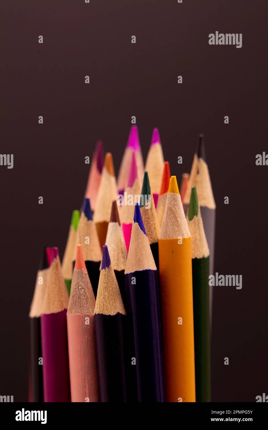 Dynamic close up still life of art coloured pencils grouped together in ...